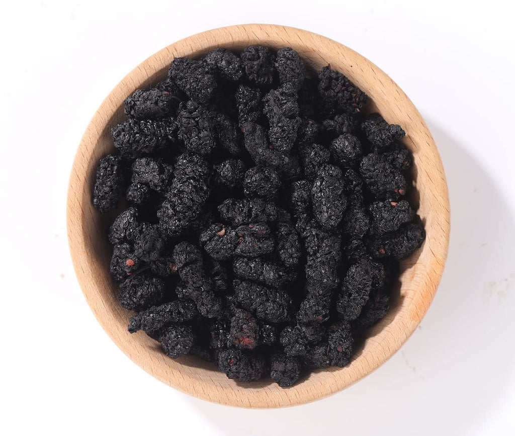 Hand picked dried black mulberries for tea