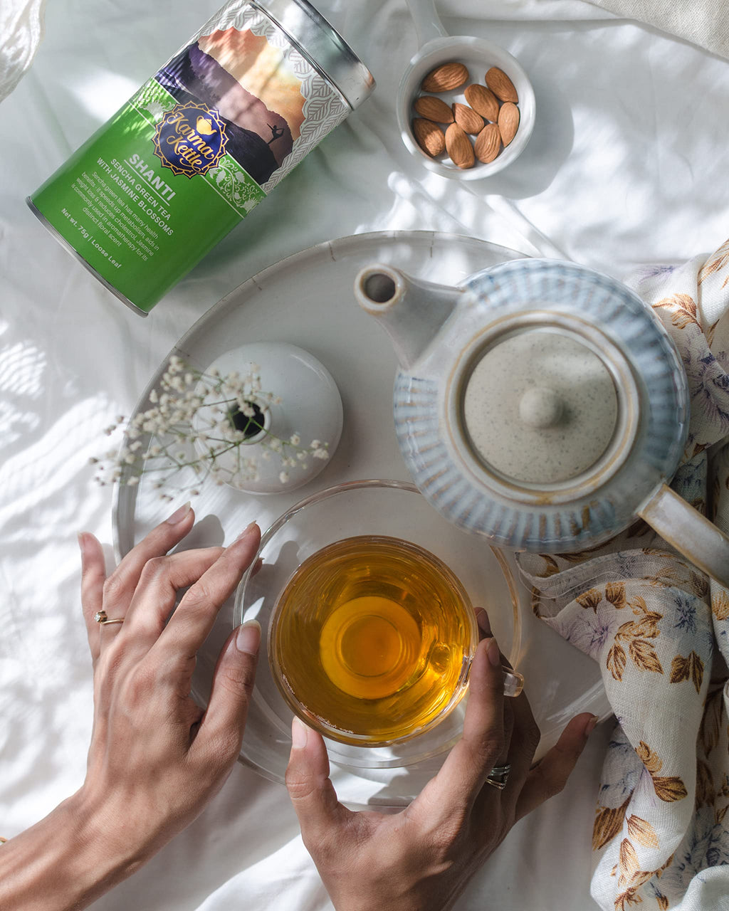 jasmine blossoms in green tea