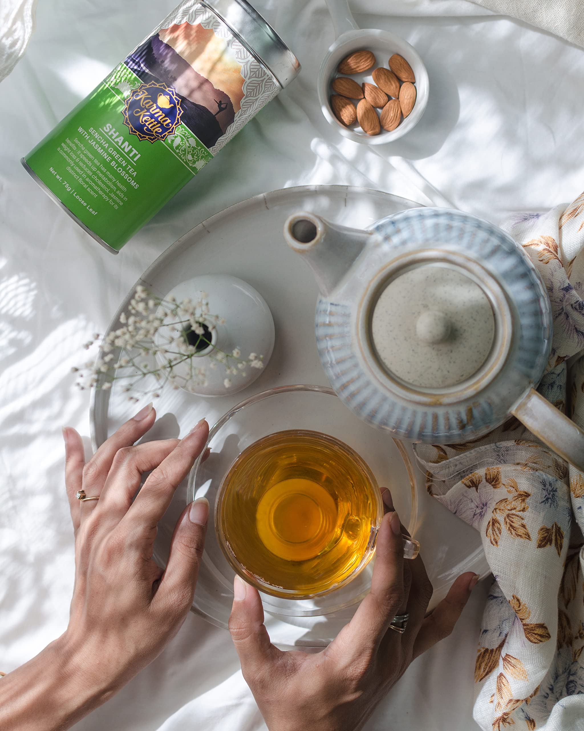 jasmine blossoms in green tea