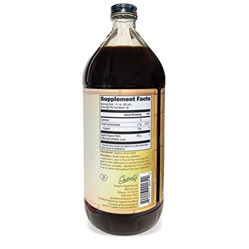 noni juice in glass bottle